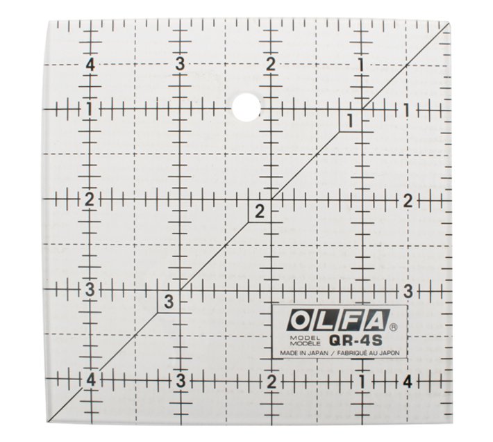 Someone’s in a Makro OLFA Quilt Ruler 4 X 4 Square With Grid Mood