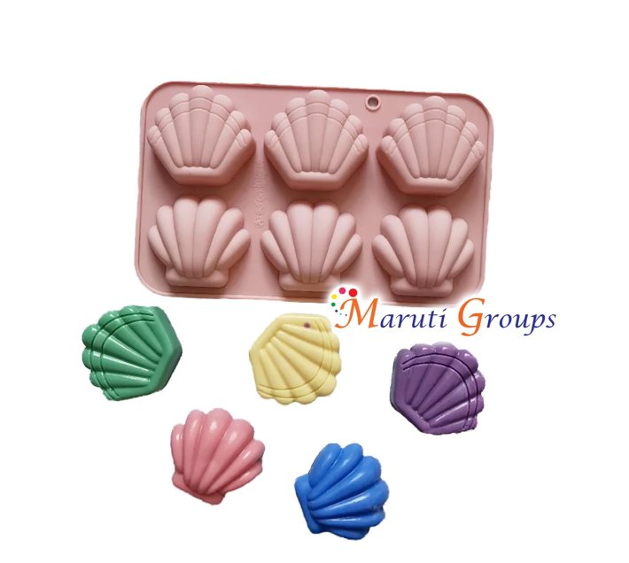 Someone’s in a Makro Big Sea Shell / Silicone Madeleine Shell Molds 6 ...